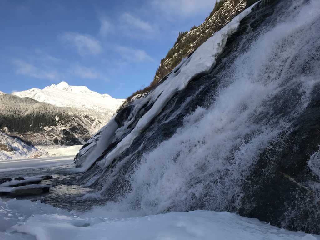Nugget Falls cascades into Mendenhall Lake; Mendenhall Glacier in ...